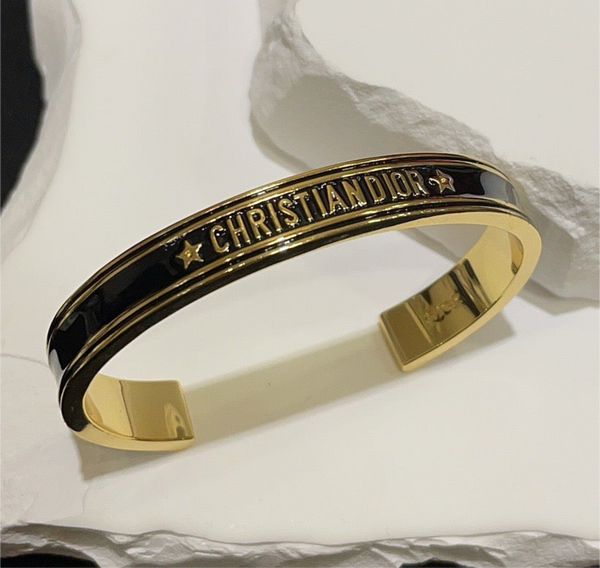 Christian Dior Bracelet open-end gold black bangle – CWG Christian Dior Bracelet open-end gold black bangle – CWG